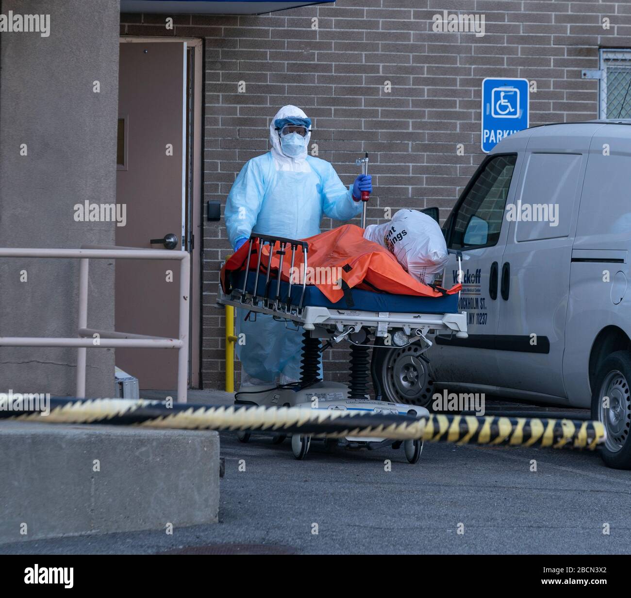 New York, NY - April 4, 2020: Body of deceased patient in orange bag ...