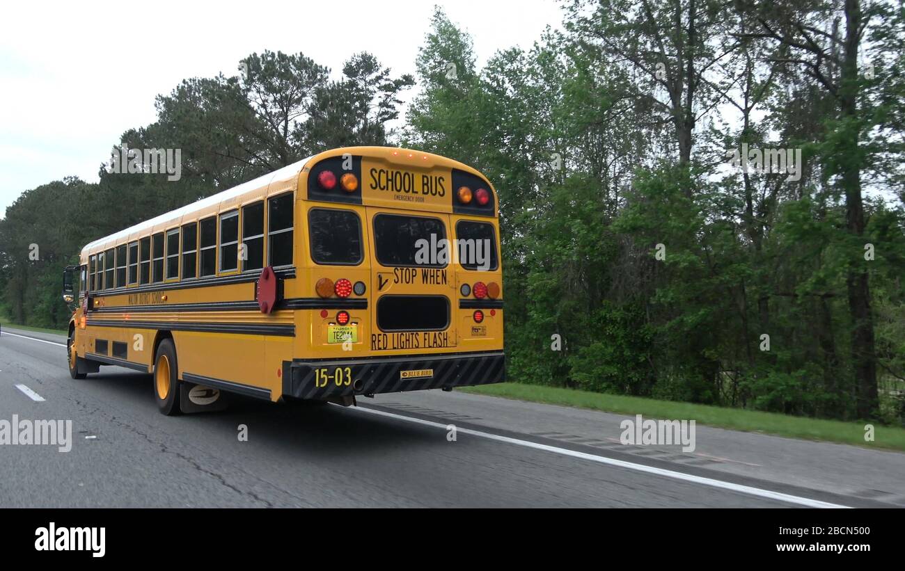 School Bus on a highway in Florida - DAYTONA BEACH, USA – APRIL 14 ...