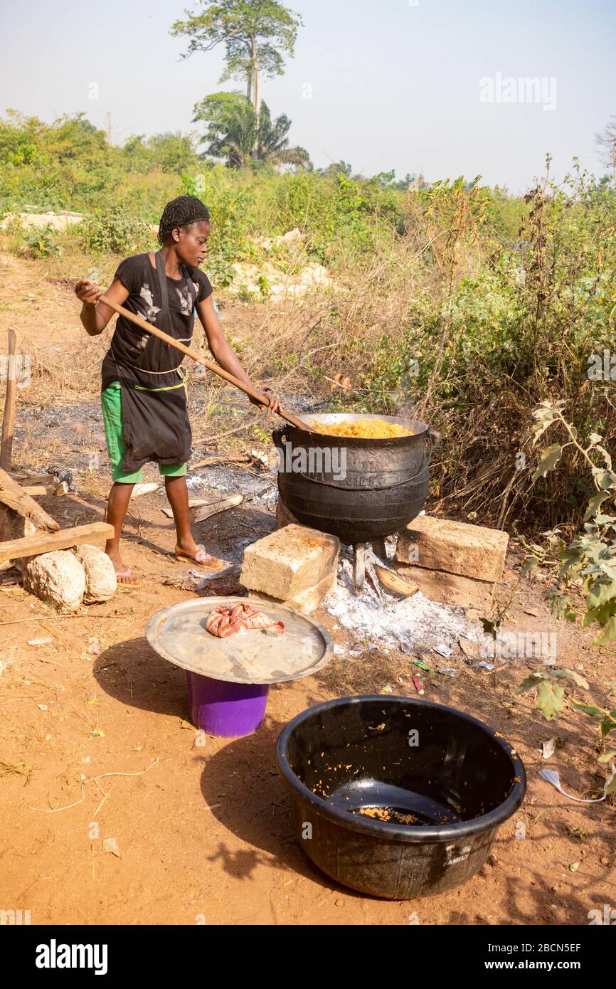 One person cooking in big pot hi-res stock photography and images - Alamy