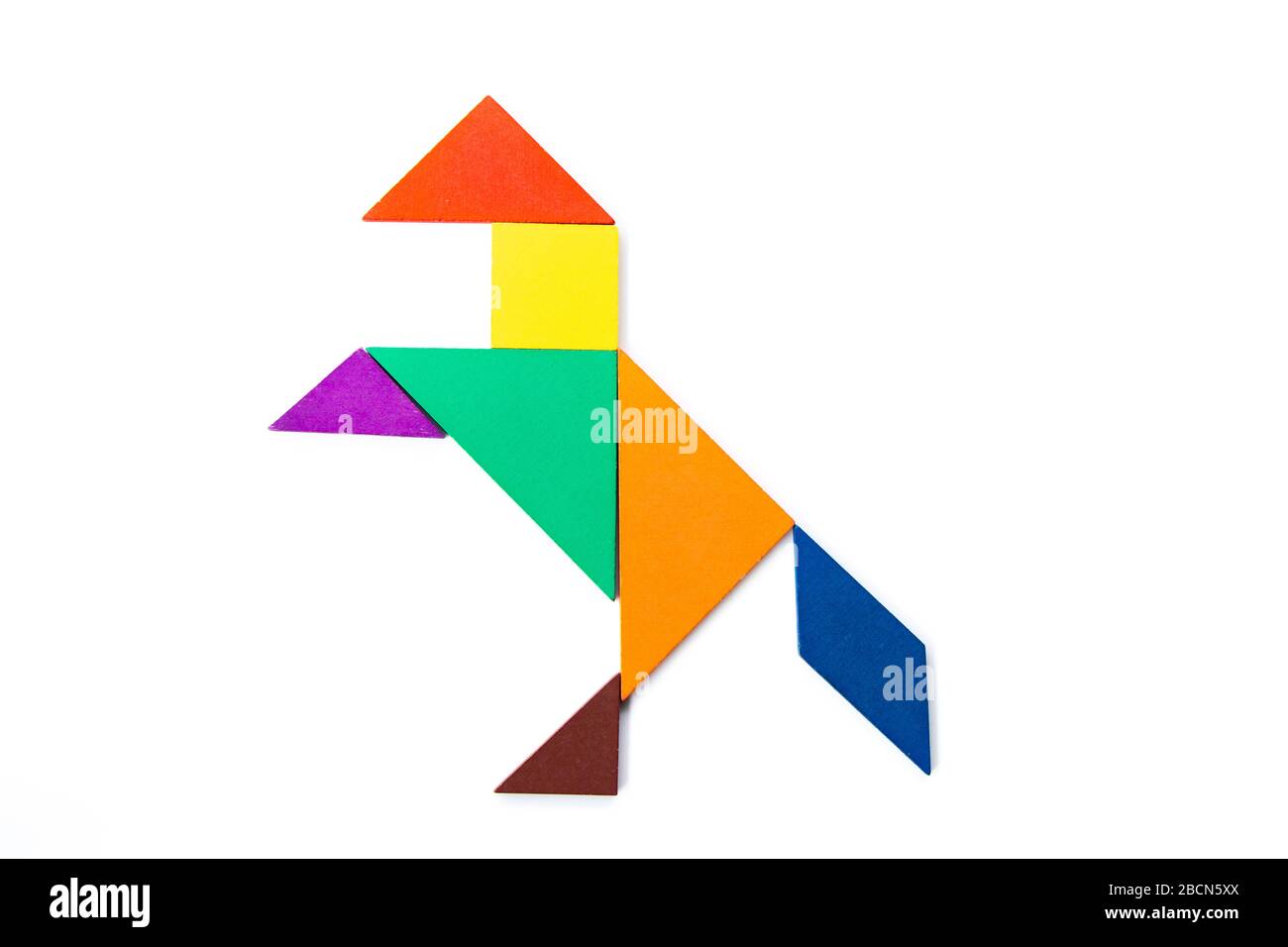 Color wood tangram puzzle in horse or mustang shape on white background ...