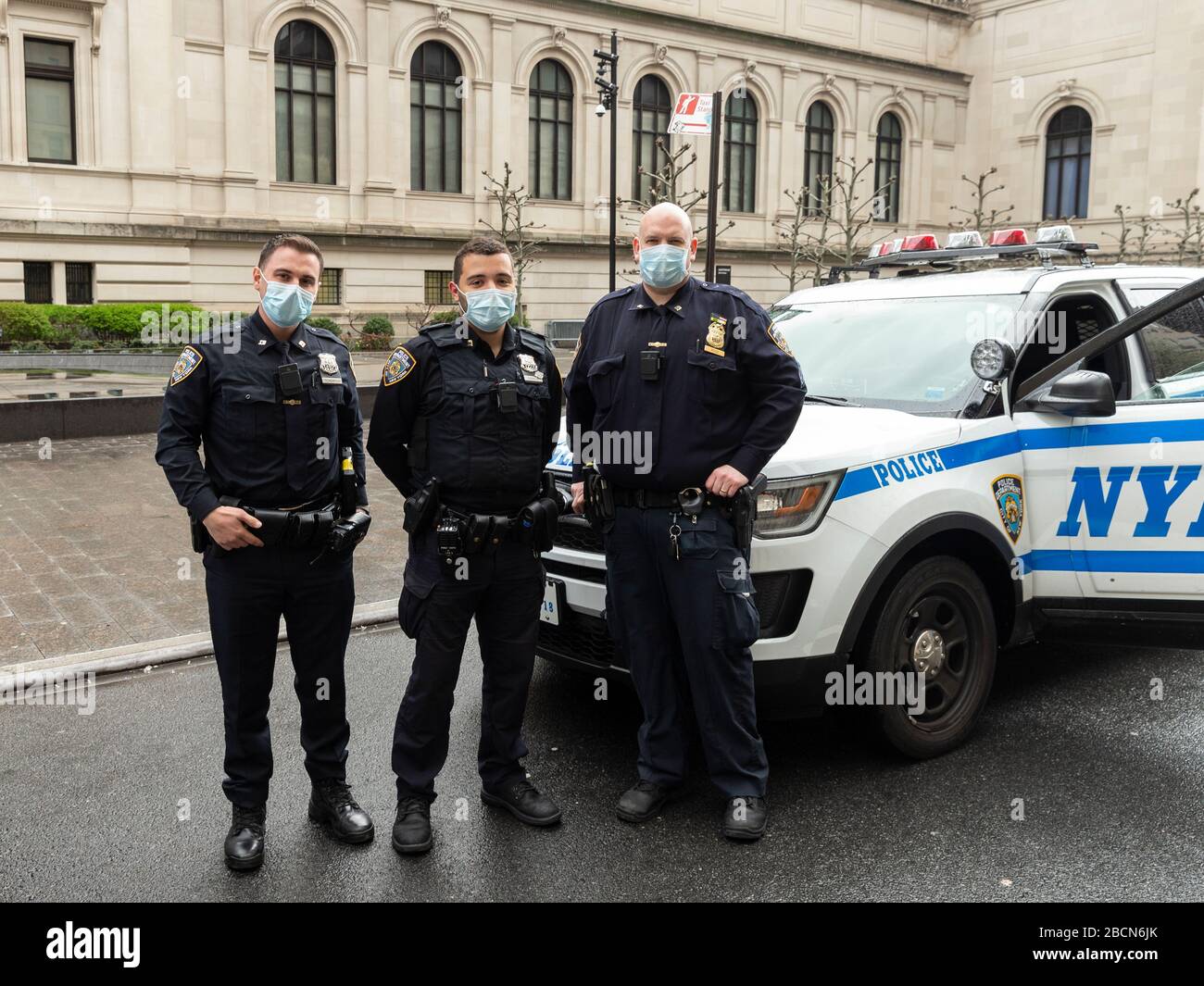 New York, NY - April 4, 2020: During COVID-19 outbreak some workers ...