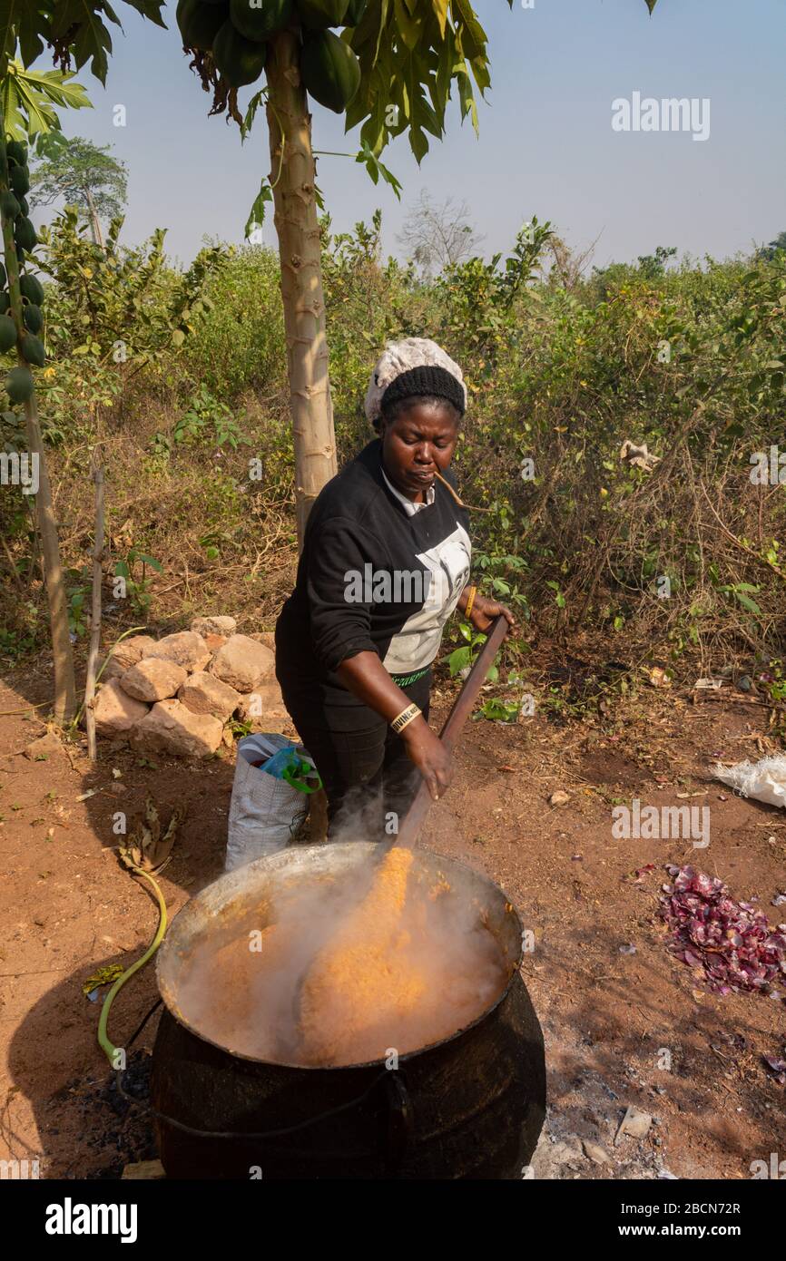 One person cooking in big pot hi-res stock photography and images - Alamy