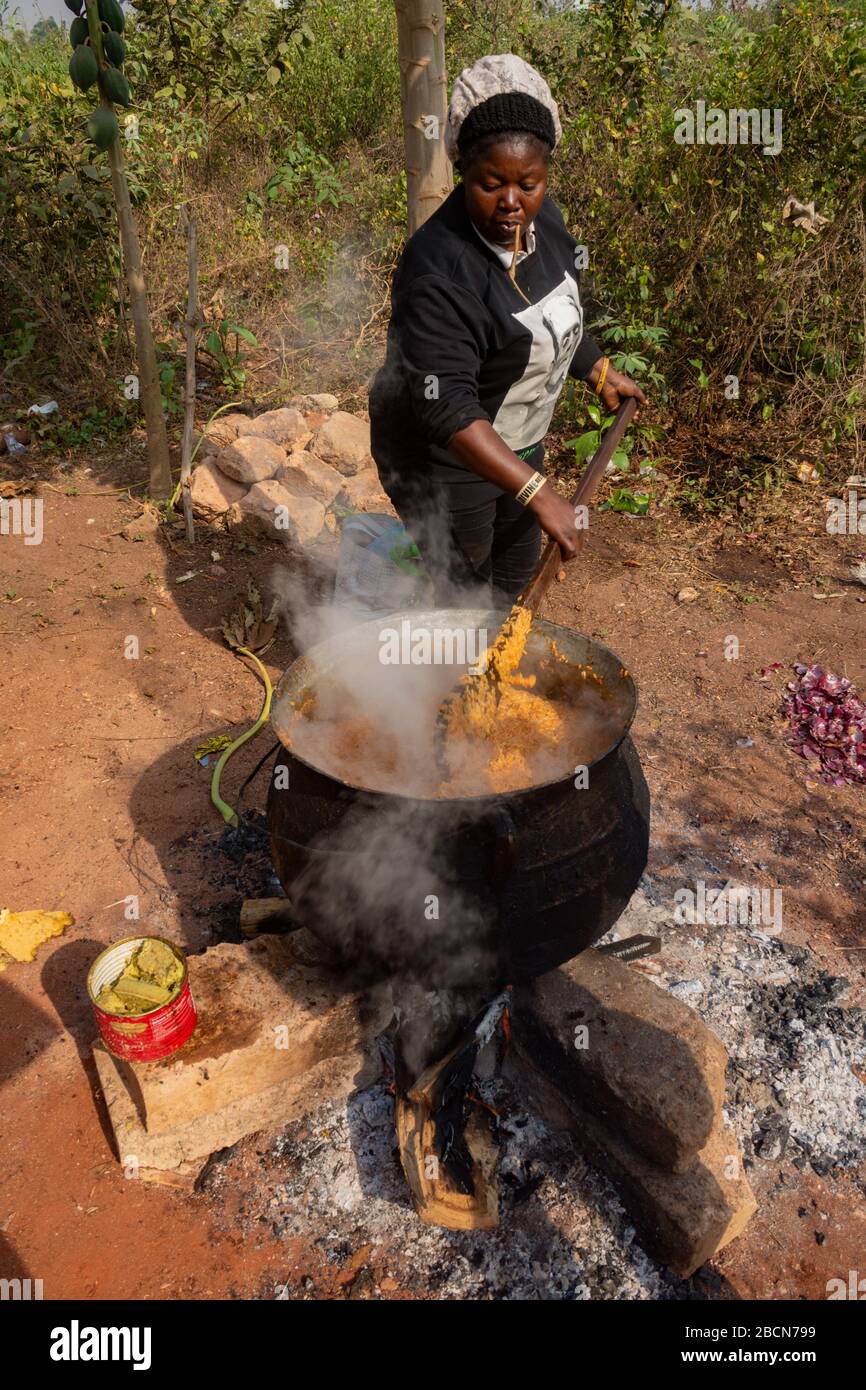 African woman cooking in a large pot hi-res stock photography and ...