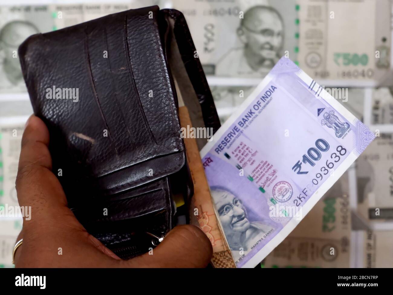 In this photo illustration One Hundred (Blue) Rupee notes are seen on ...