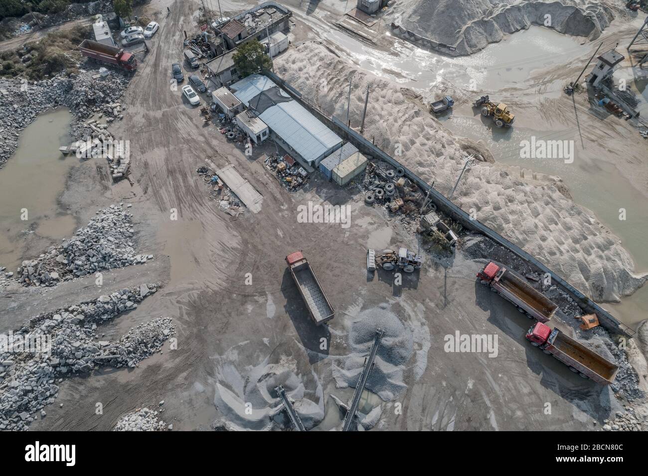 Aerial view of crushed stone quarry machine in a construction material ...