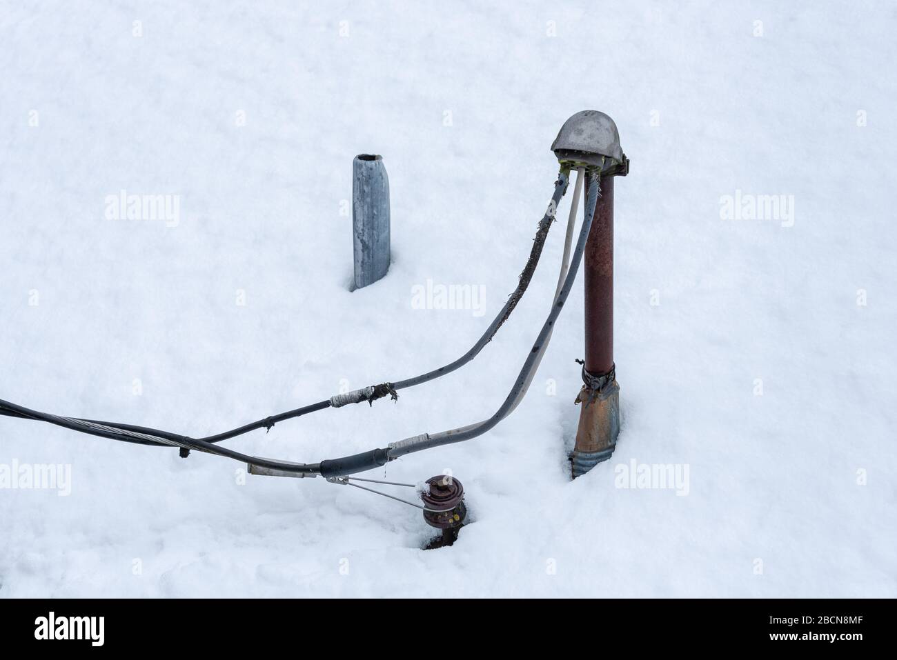 Residential house rooftop covered in fresh snow, close-up of weathered ...