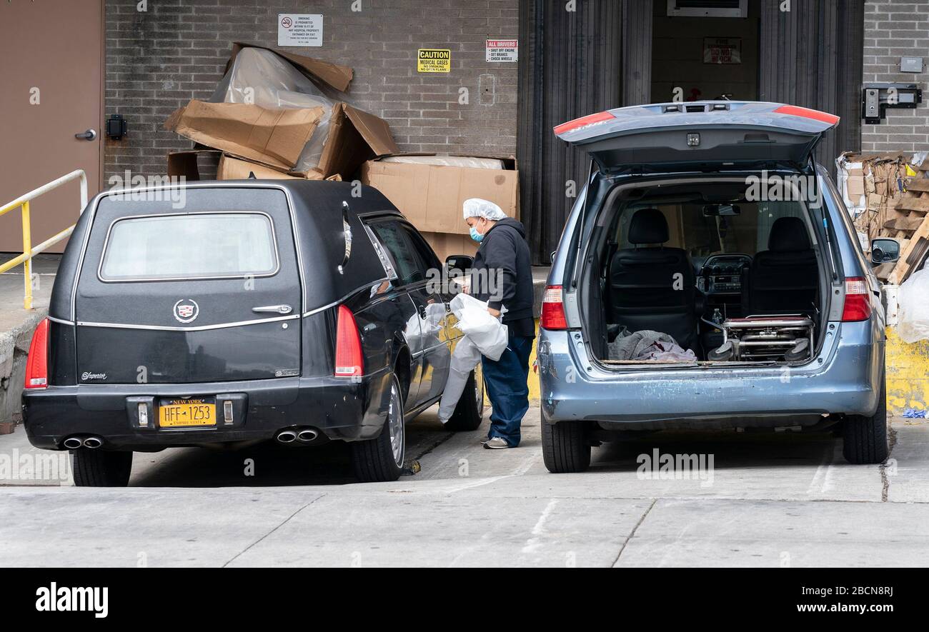 New York, United States. 04th Apr, 2020. Funeral home worker puts on ...