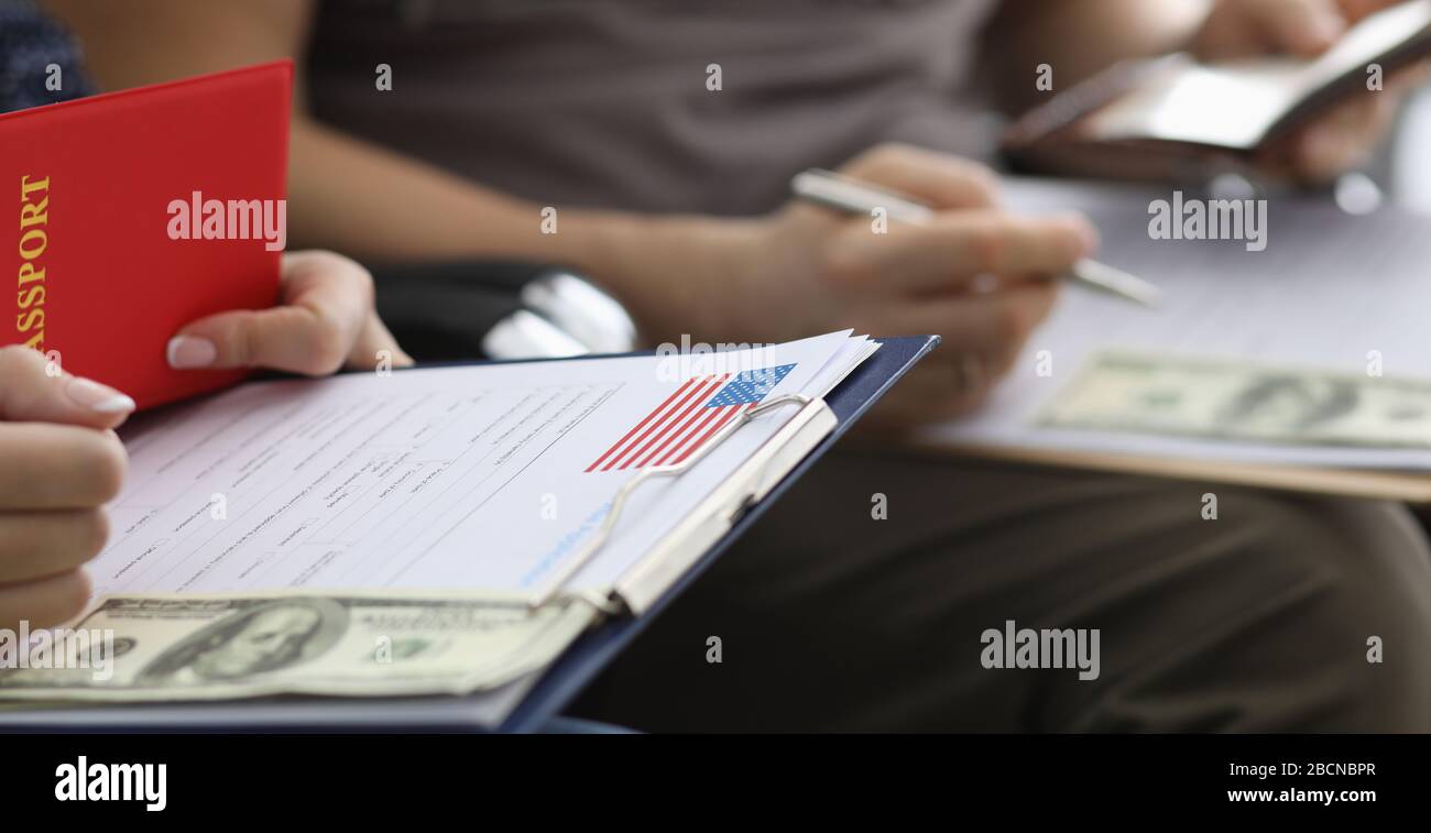 People write passport details in application form Stock Photo - Alamy