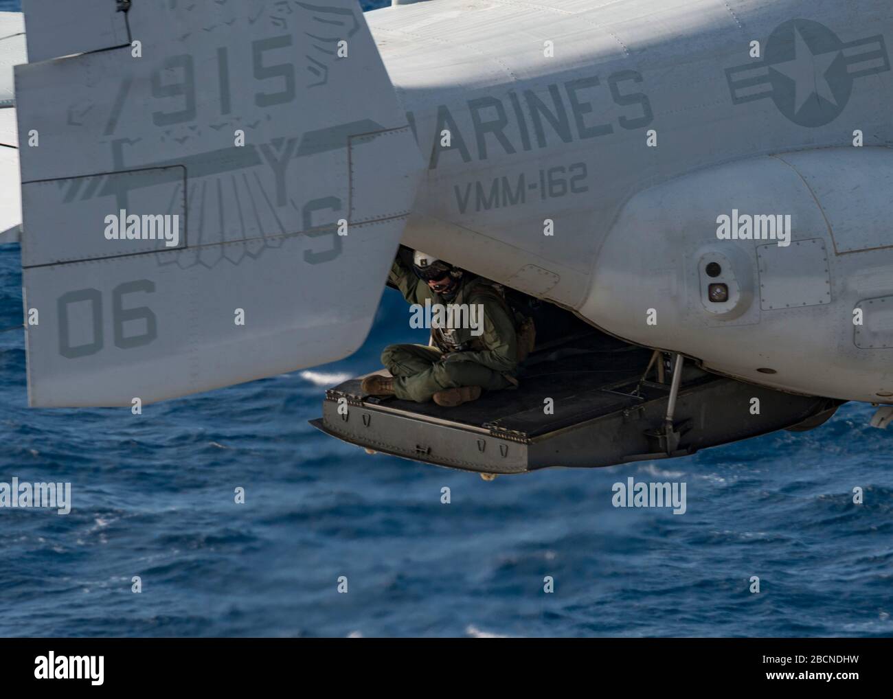 ATLANTIC OCEAN (Feb. 22, 2020) – A marine plane captain sits on the aft ...