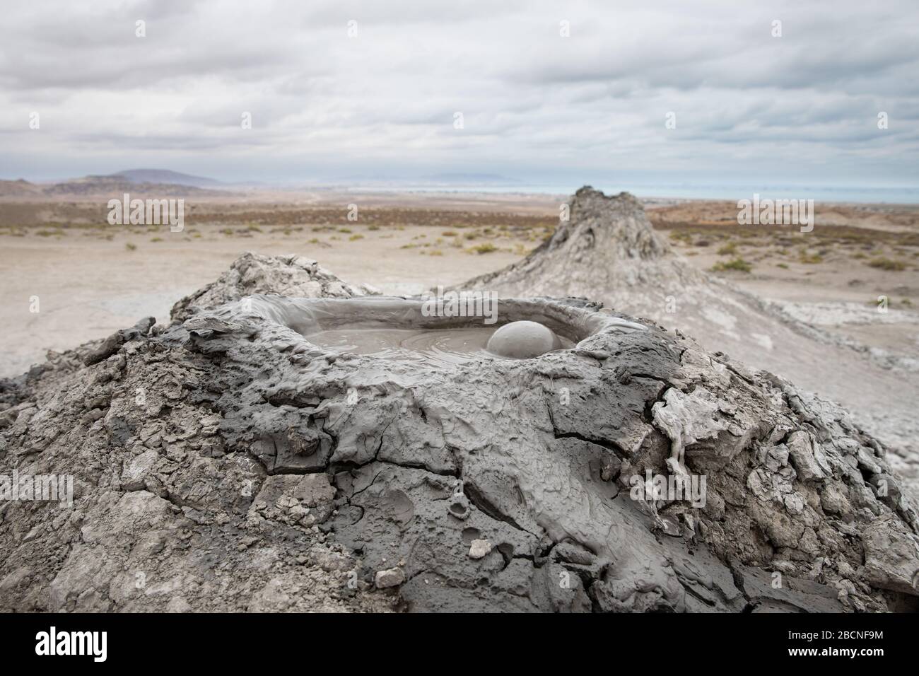 Tourist attraction of Baku mud volcanoes on a cloudy day. Baku ...