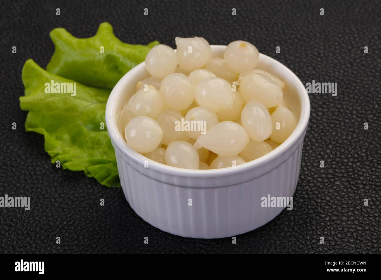 Pickled baby onion in the bowl Stock Photo - Alamy