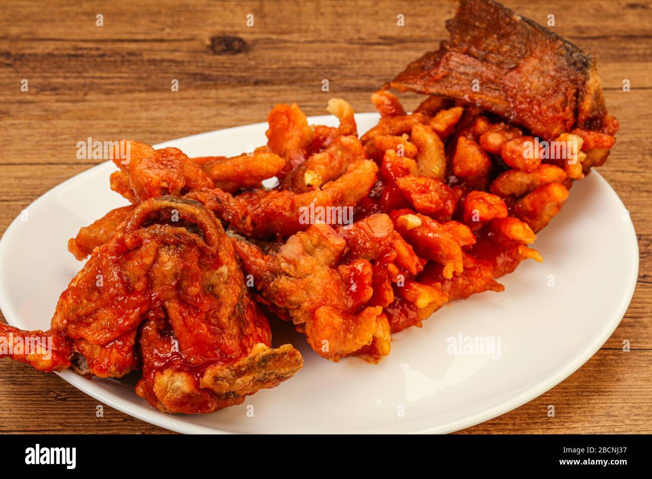 Chinese cuisine squirrel fish with sweet sauce Stock Photo - Alamy