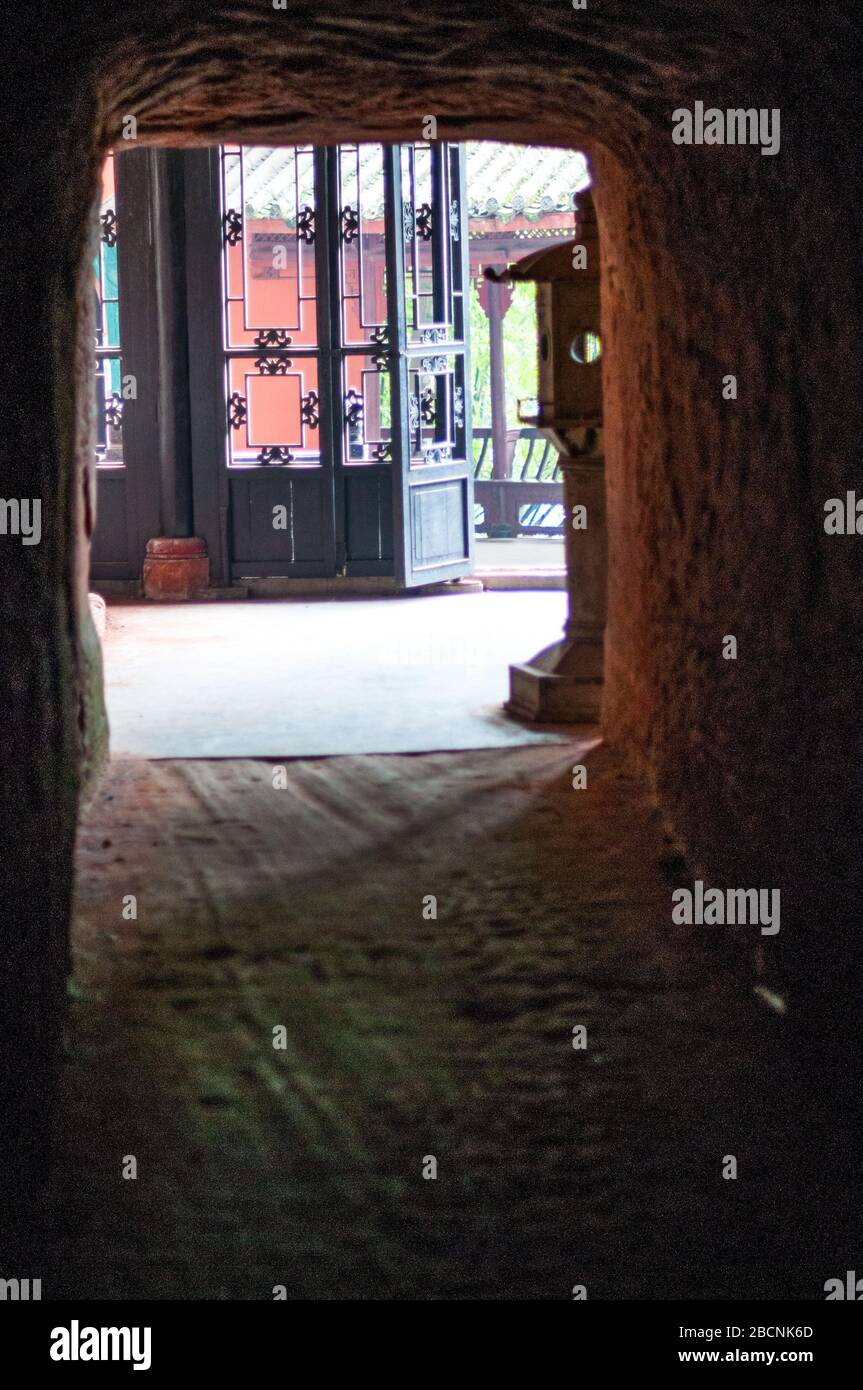 A cave near the base of the Grand Buddha, Leshan, Sichuan Province ...