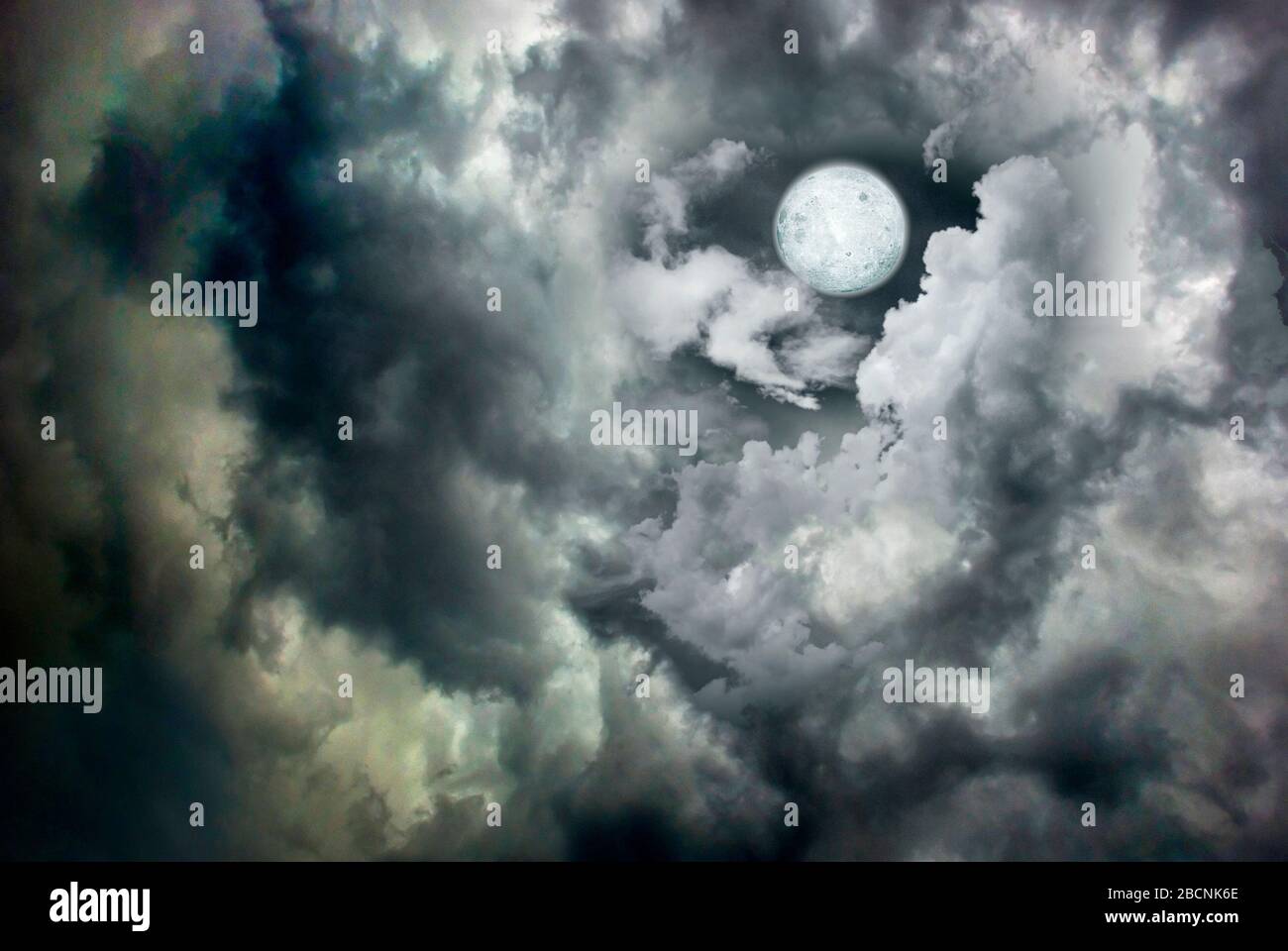 Full moon through break in hi-res stock photography and images - Alamy