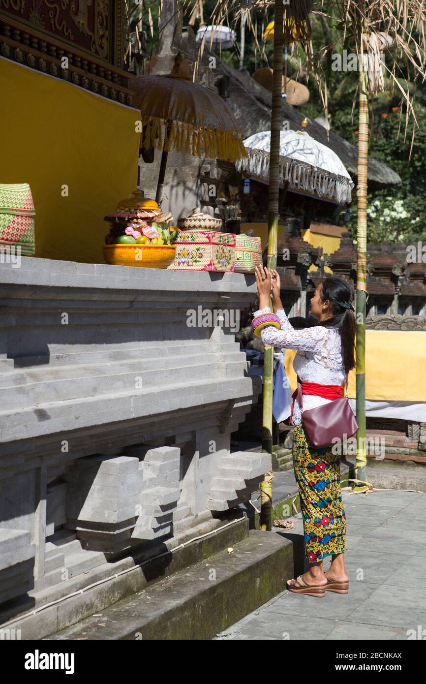 Woman makes offering gods hi-res stock photography and images - Alamy