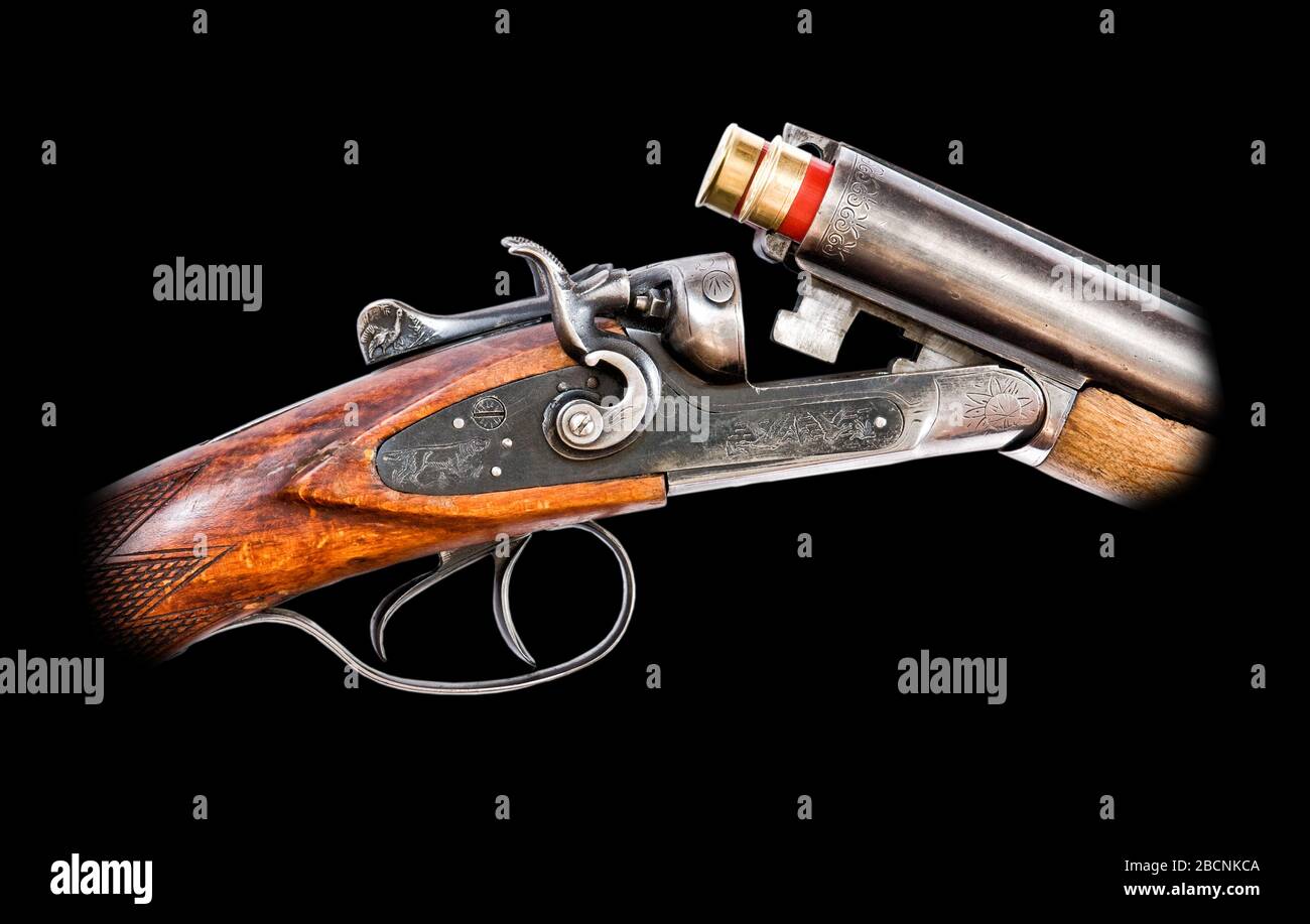 Mechanism of hunting rifle close-up, isolated on a black background ...