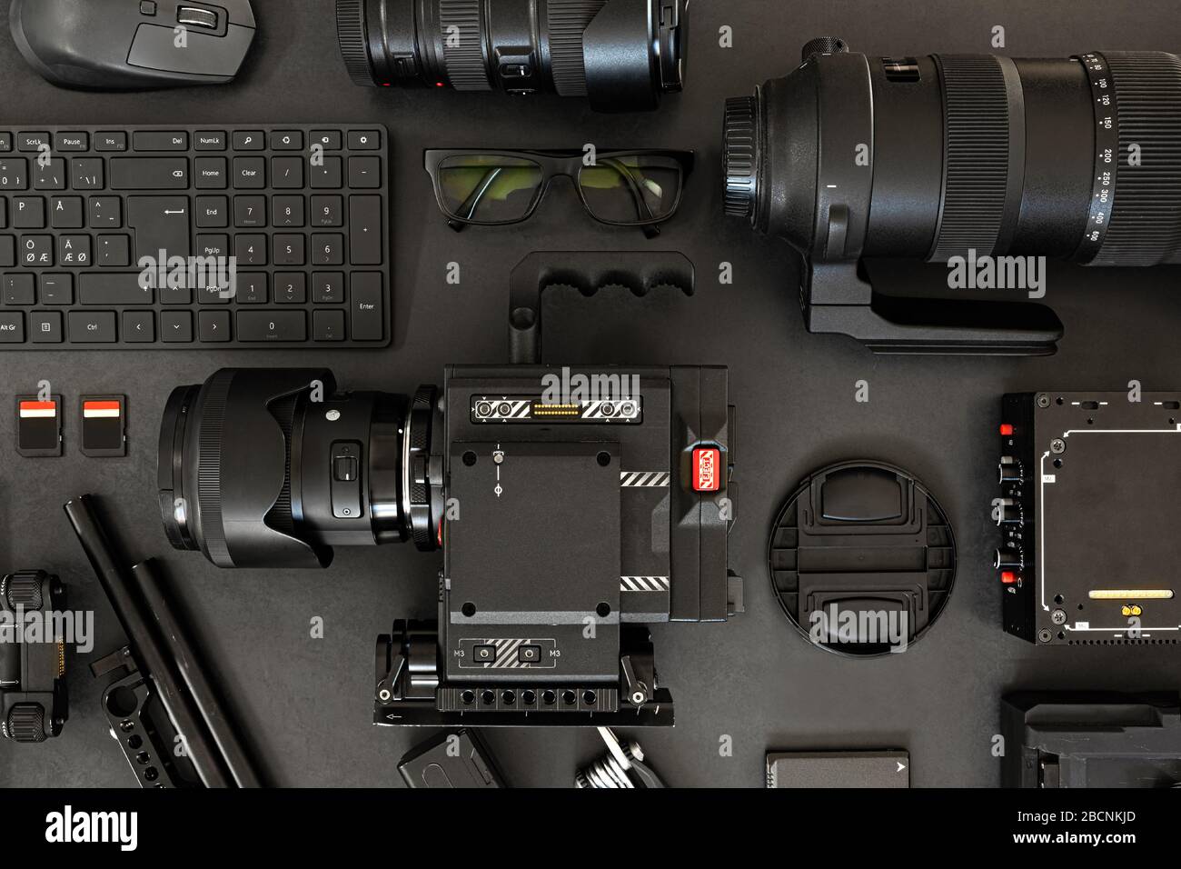 Top View of a Creative Filmmakers Office Desk with Lined up Camera and ...