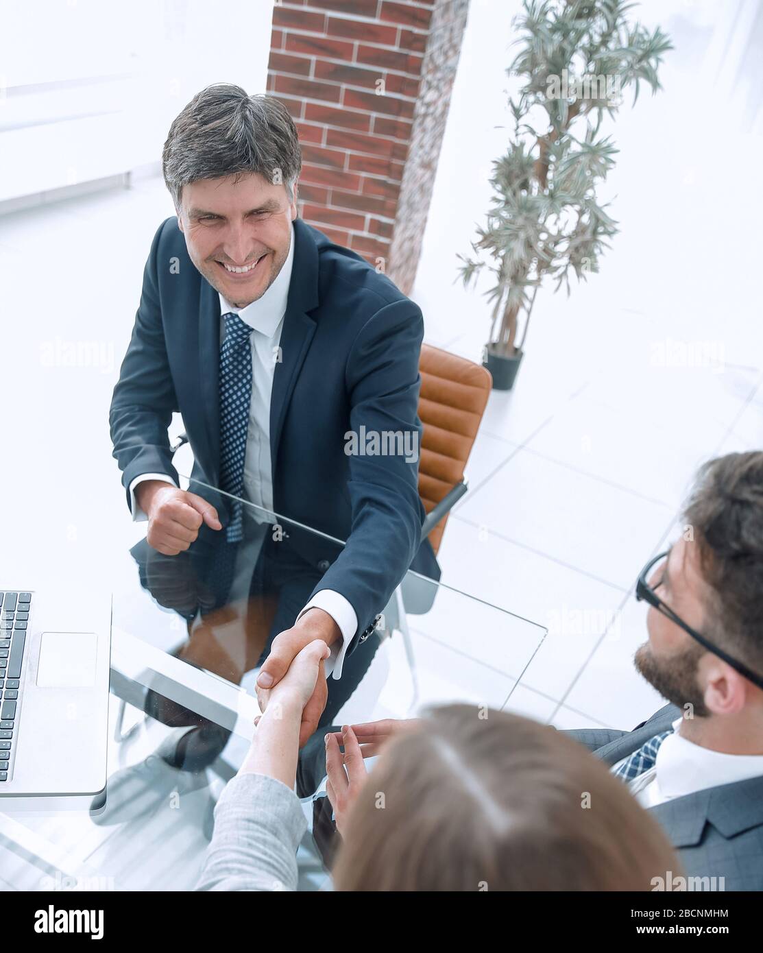 welcome handshake between a lawyer and a client Stock Photo - Alamy