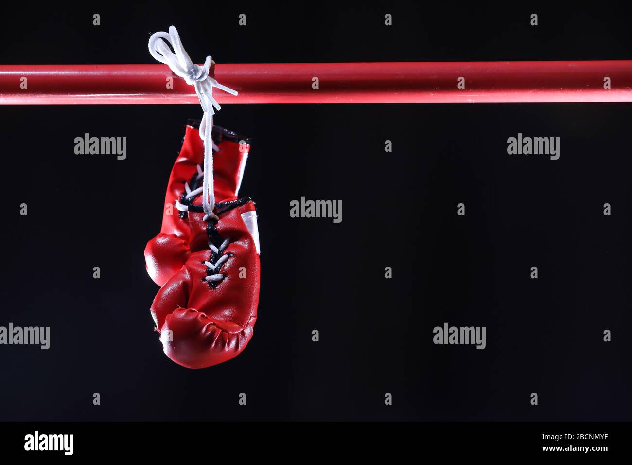 Red boxing gloves on a ring. Boxing and kickboxing competition Stock ...