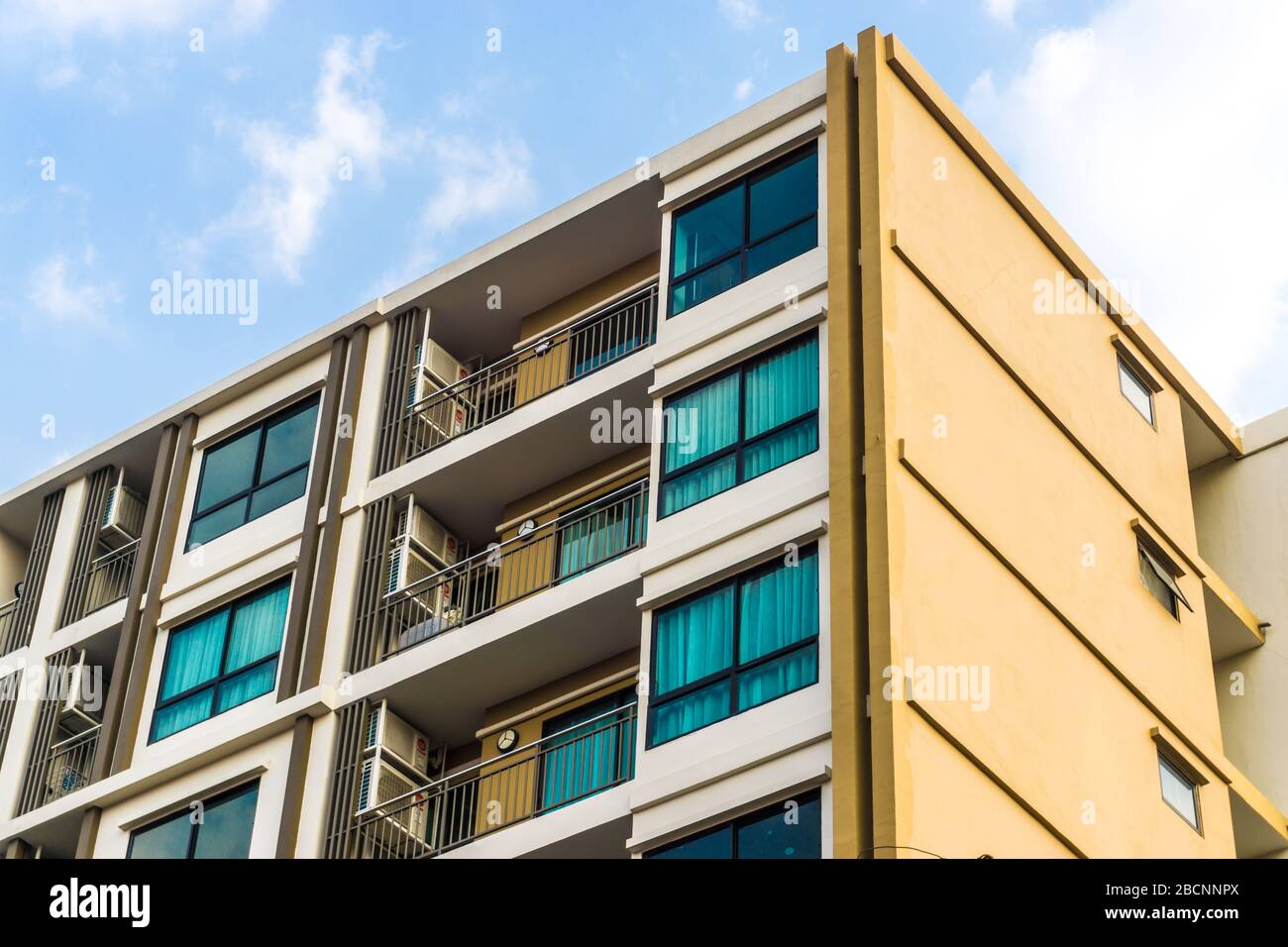Modern condominium building in the city sky cloud background, Lowrise ...