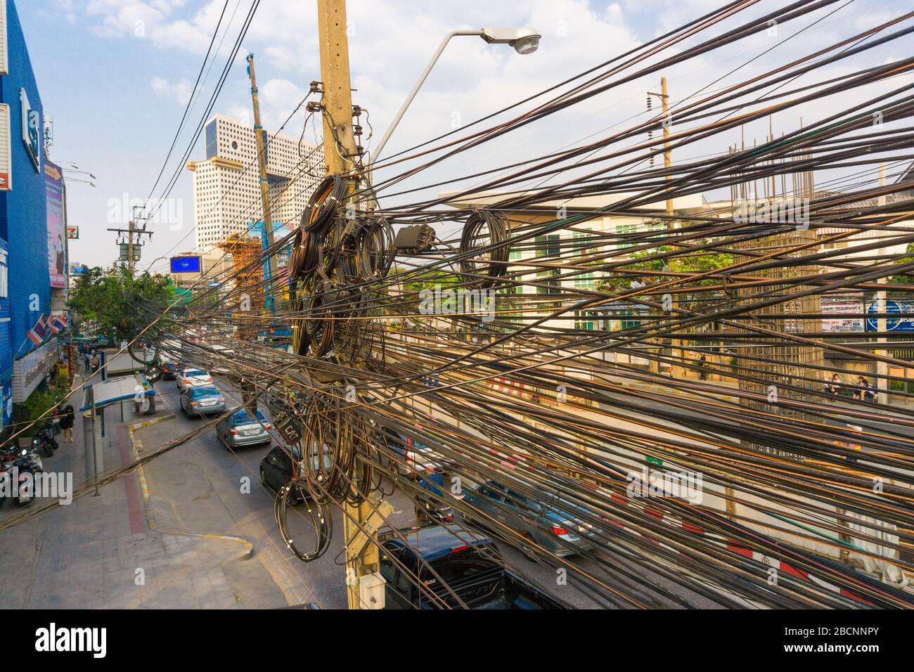 Electrical and network phone line on pole in city infrastructure object ...
