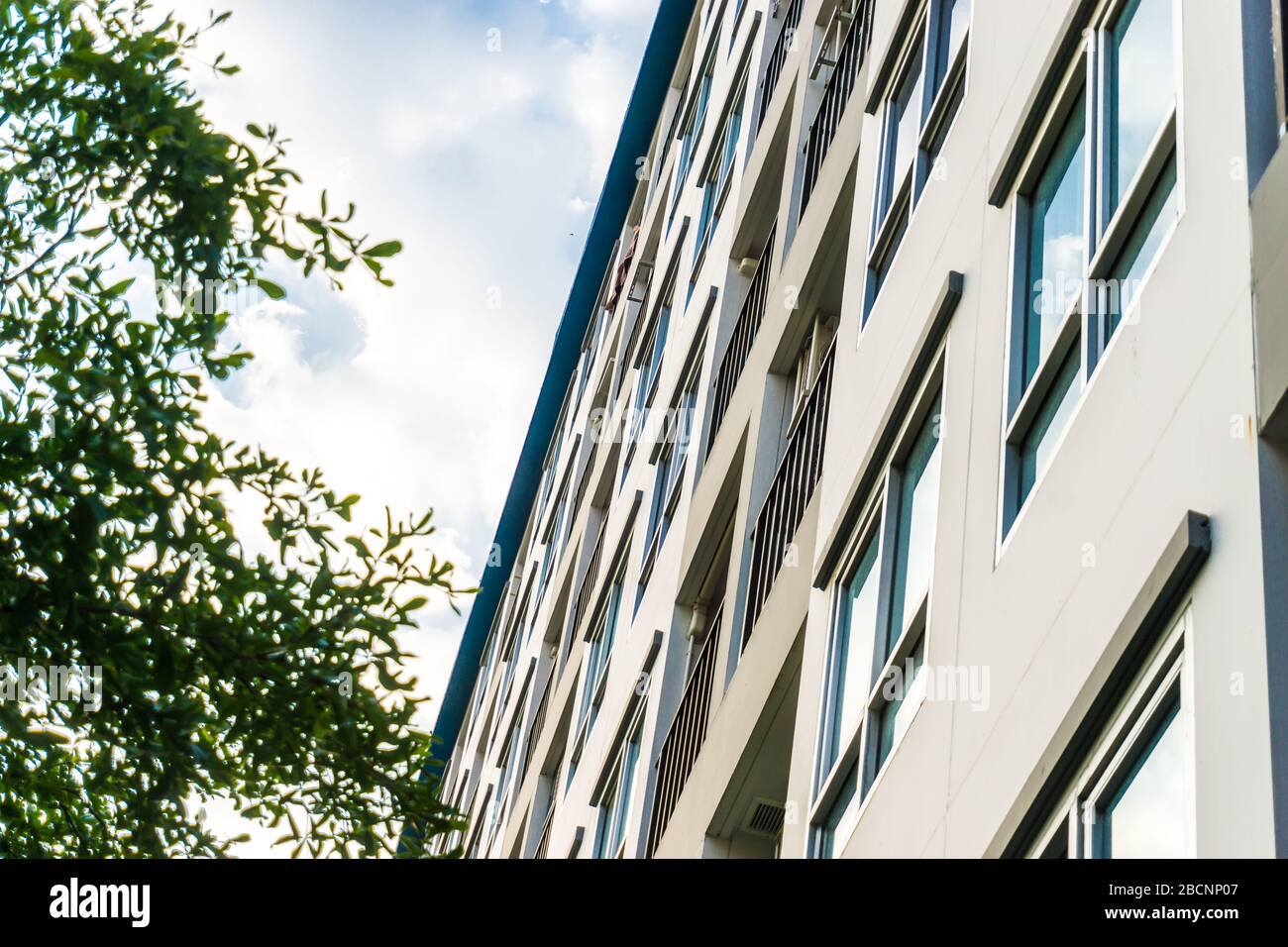 Modern condominium building in the city sky cloud background, Lowrise ...