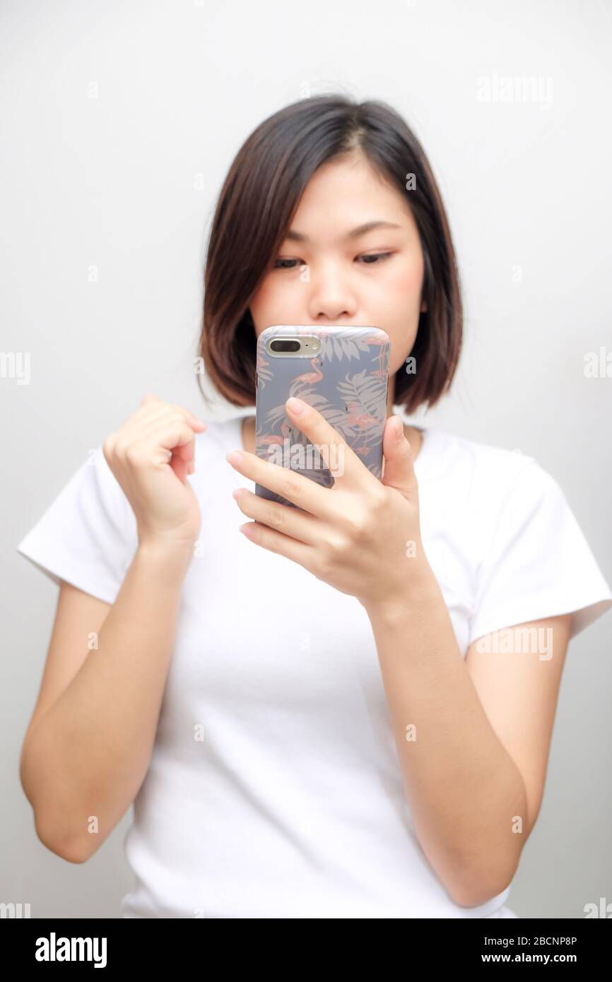 Business asian white shirt women using text on smartphone on white ...