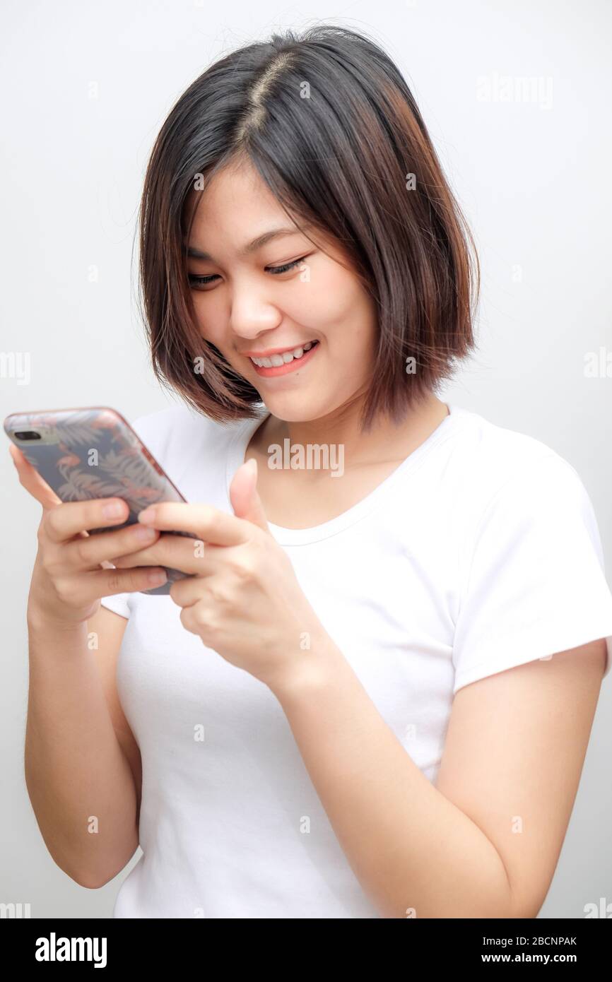 Business asian white shirt women using text on smartphone on white ...