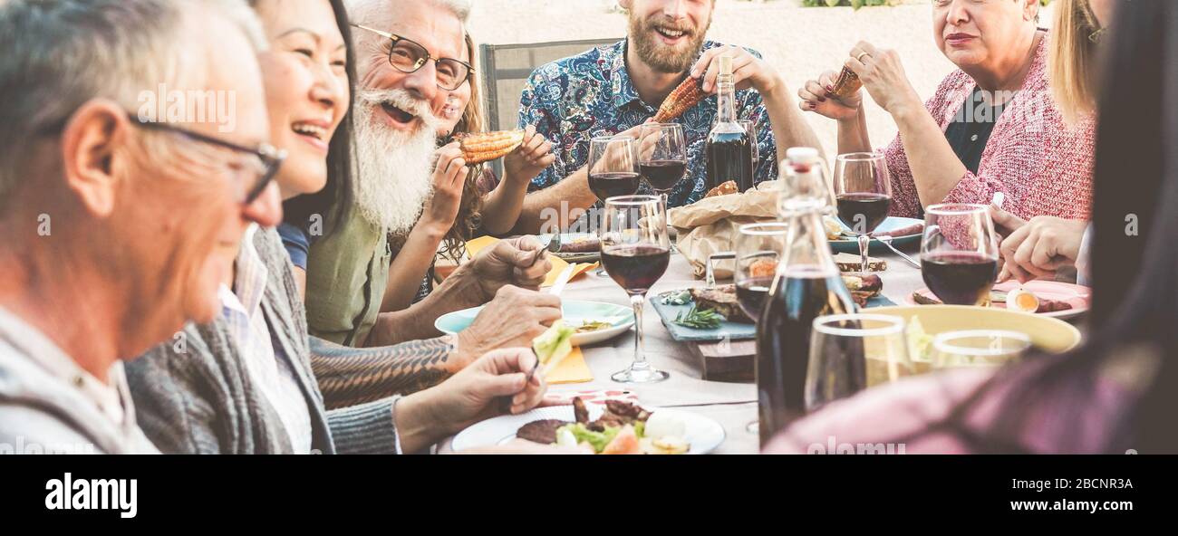 Happy family people having fun at barbecue dinner - Multiracial friends ...