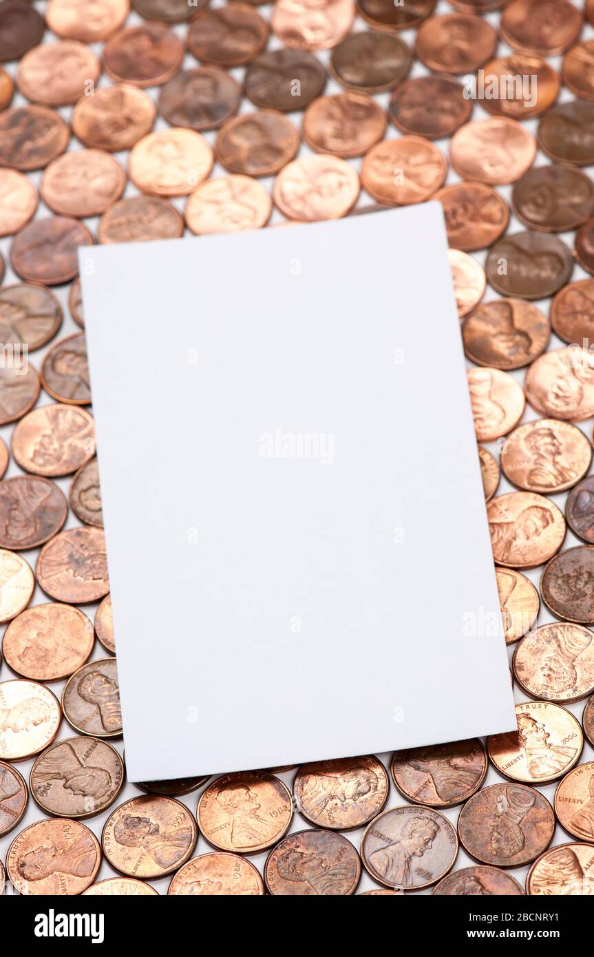 Blank white copy space sitting on background of American pennies ...