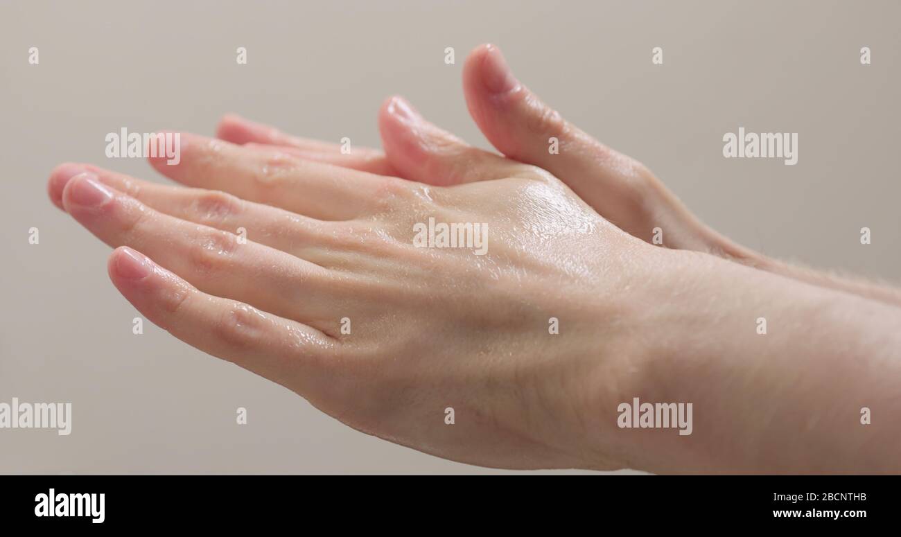 Hands sanitizing gel hi-res stock photography and images - Alamy