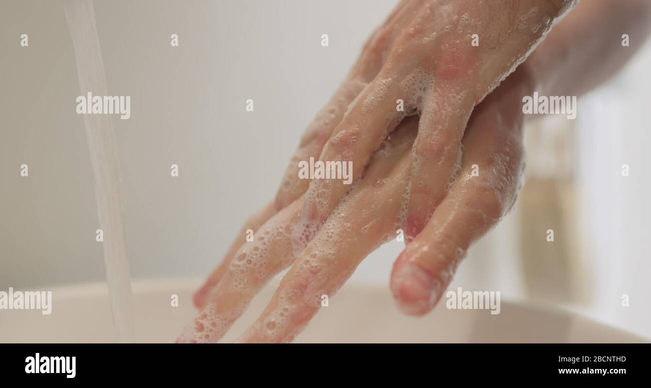Man hands washing with water and soap hi-res stock photography and ...