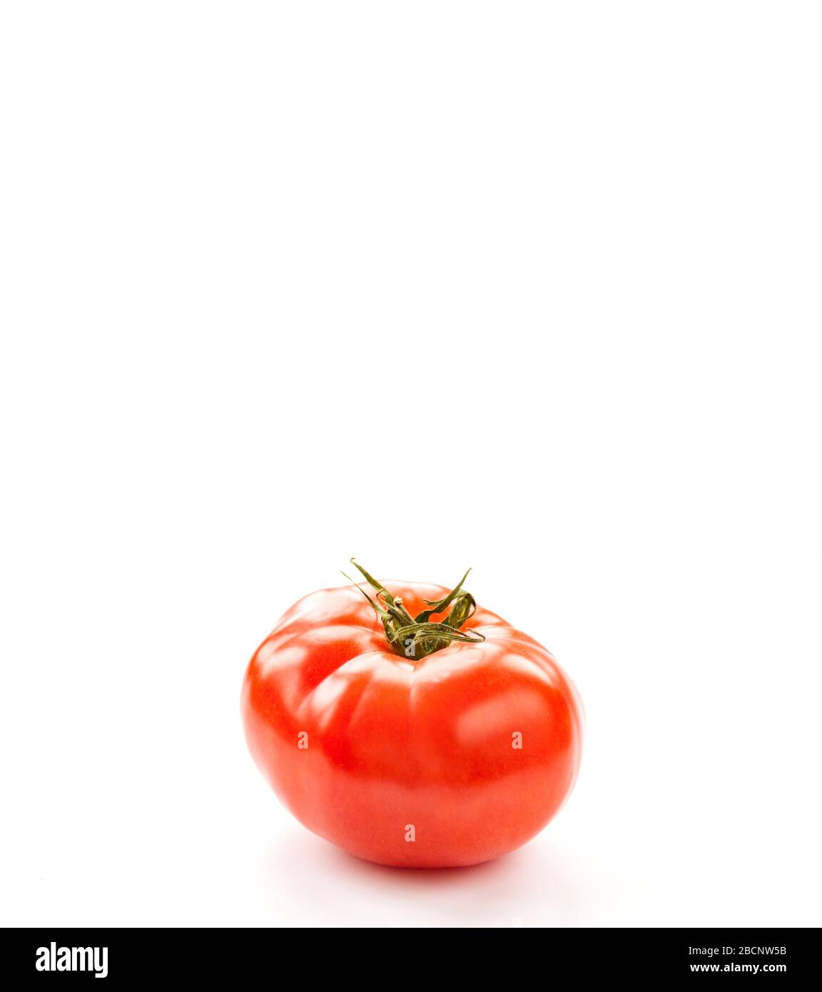 Tomato single vegetable isolated on white background cutout close up ...