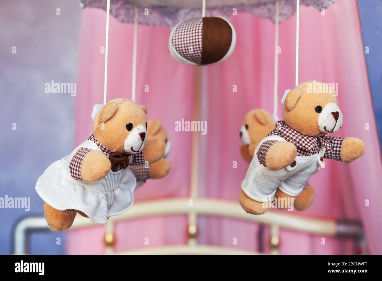 Baby music mobile carousel with little bears. Toy carousel, above the ...