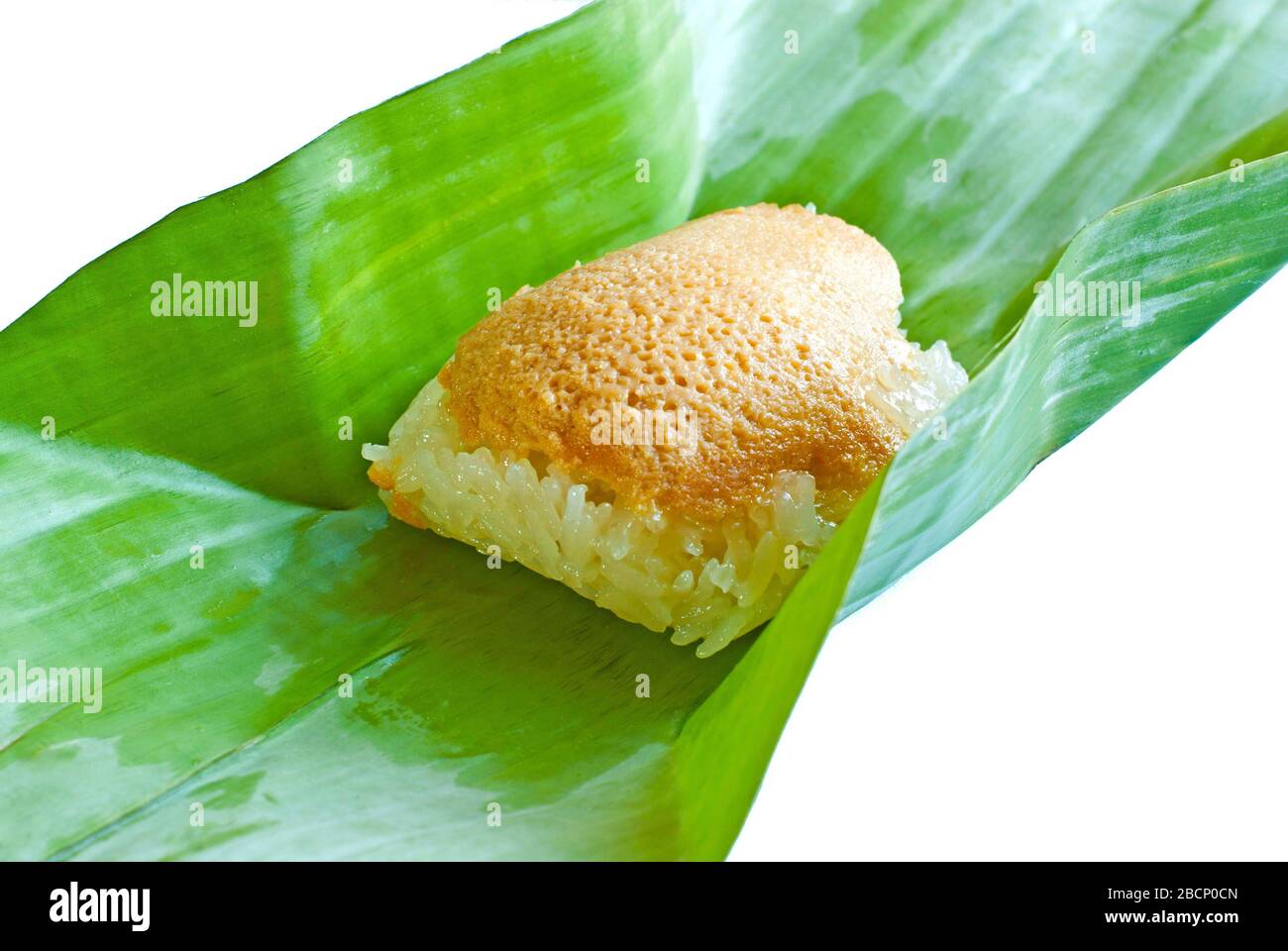 Sweet sticky rice with Thai custard in the banana leaf wrapped Stock ...