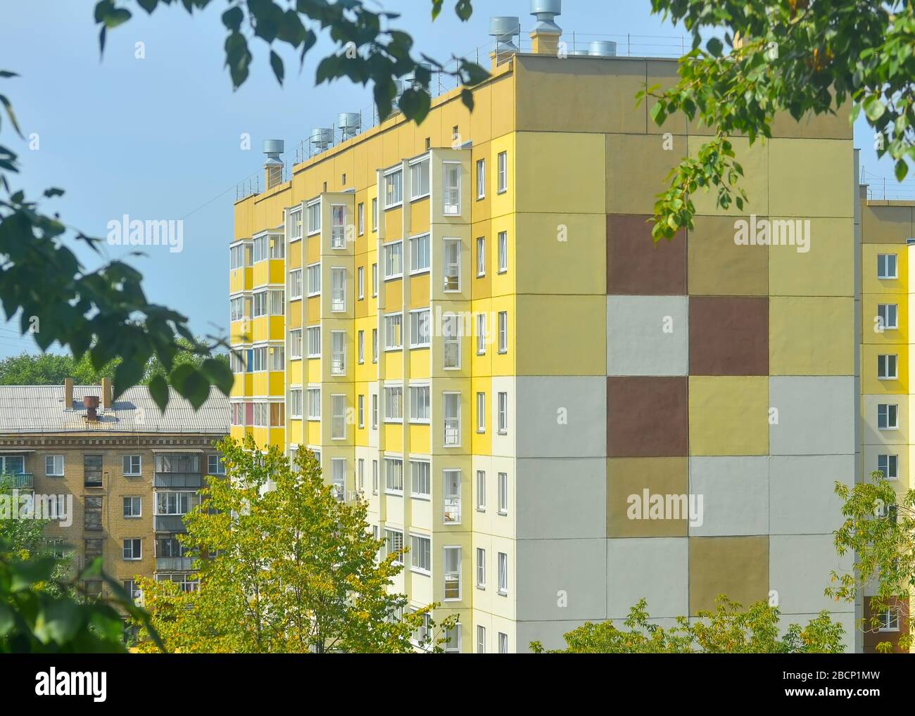 Bright facade of a model panel apartment building in a residential ...