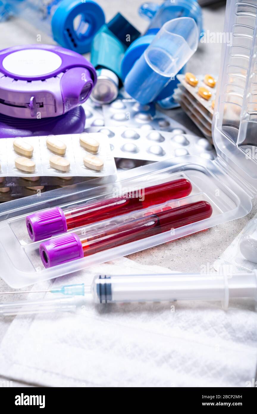 Medical test-tubes with blood samples for screening of virus, flu or ...