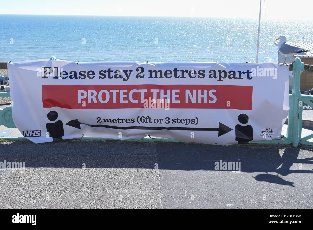 A warning sign at Brighton Beach advising people to stay 2m apart to ...