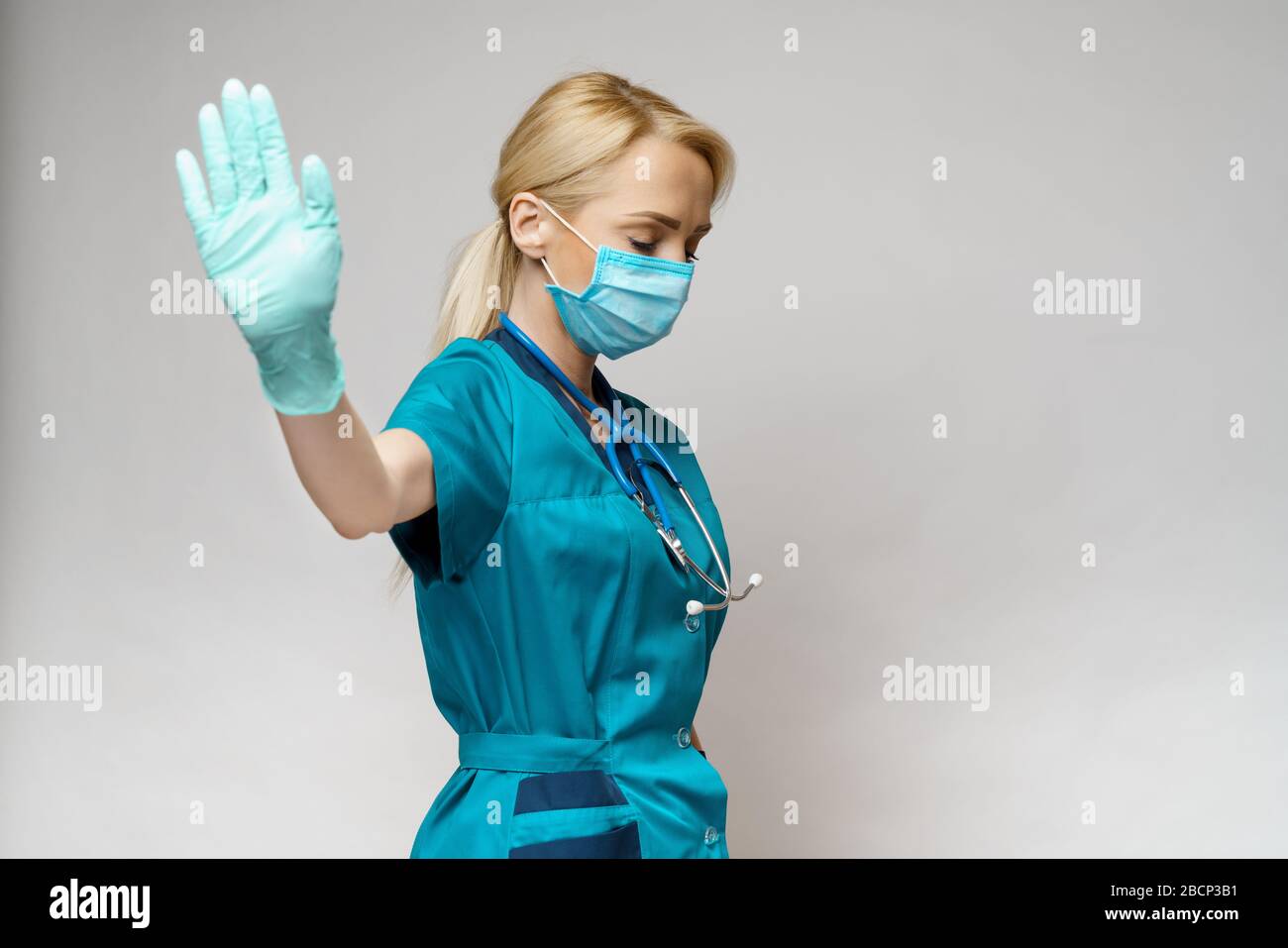 medical doctor nurse woman wearing protective mask and rubber or latex ...