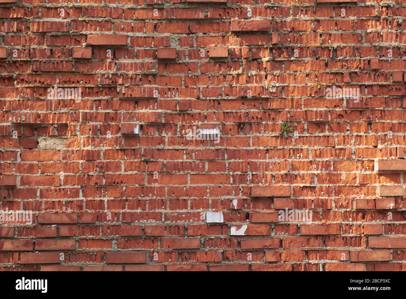 Uneven brick wall hi-res stock photography and images - Alamy