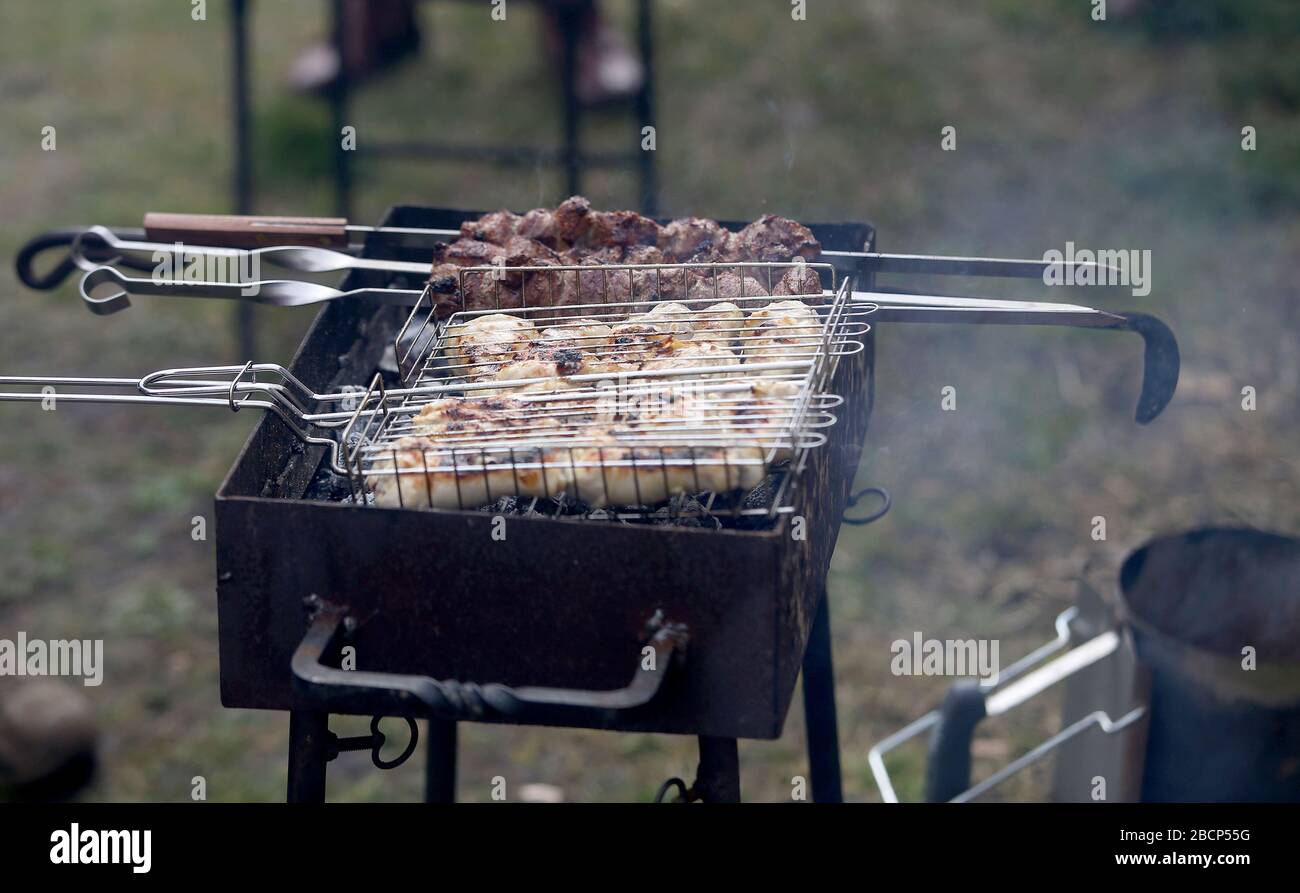 Barbecue. Fire with burning flame. Grilled meat Stock Photo - Alamy