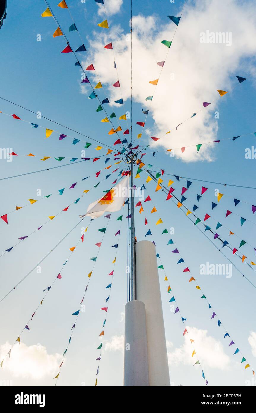 Party flags celebrating local holiday Stock Photo - Alamy