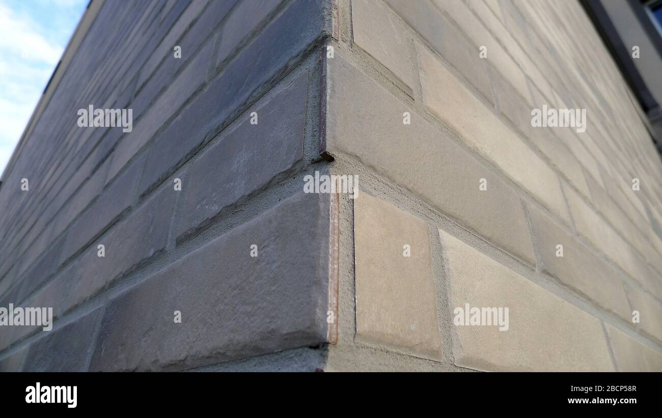 Finishing bricks in architecture, wall with trim tiles, outdoors Stock ...