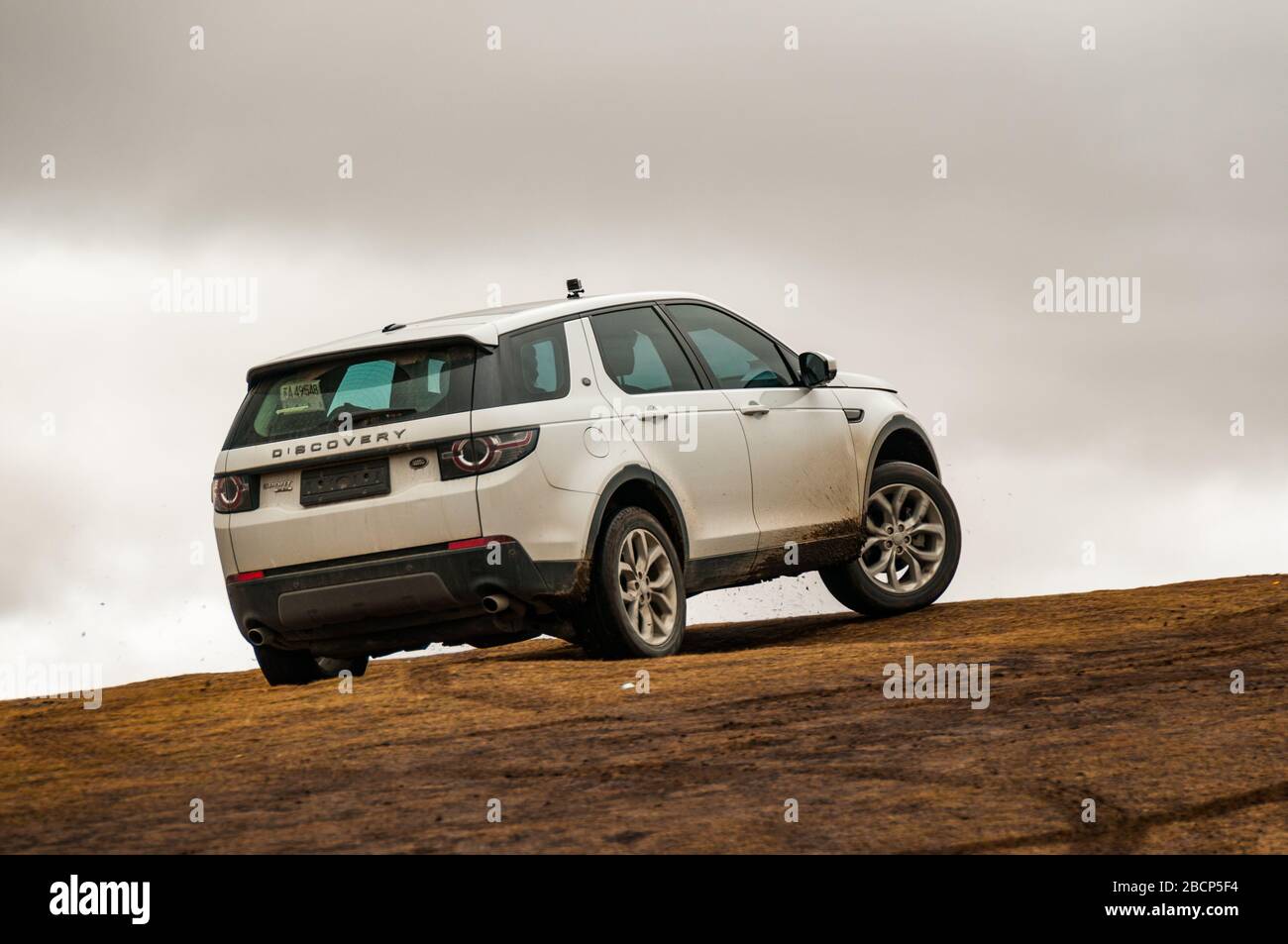Land Rover Discovery Sport being driven off road on a mountain in ...