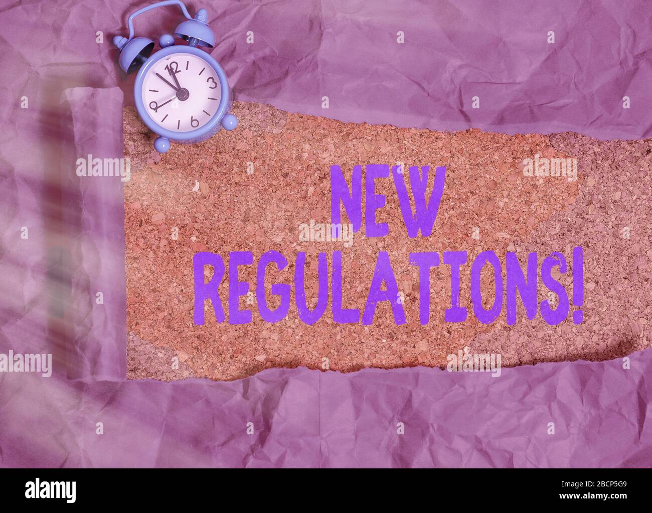 Writing note showing New Regulations. Business concept for rules made ...