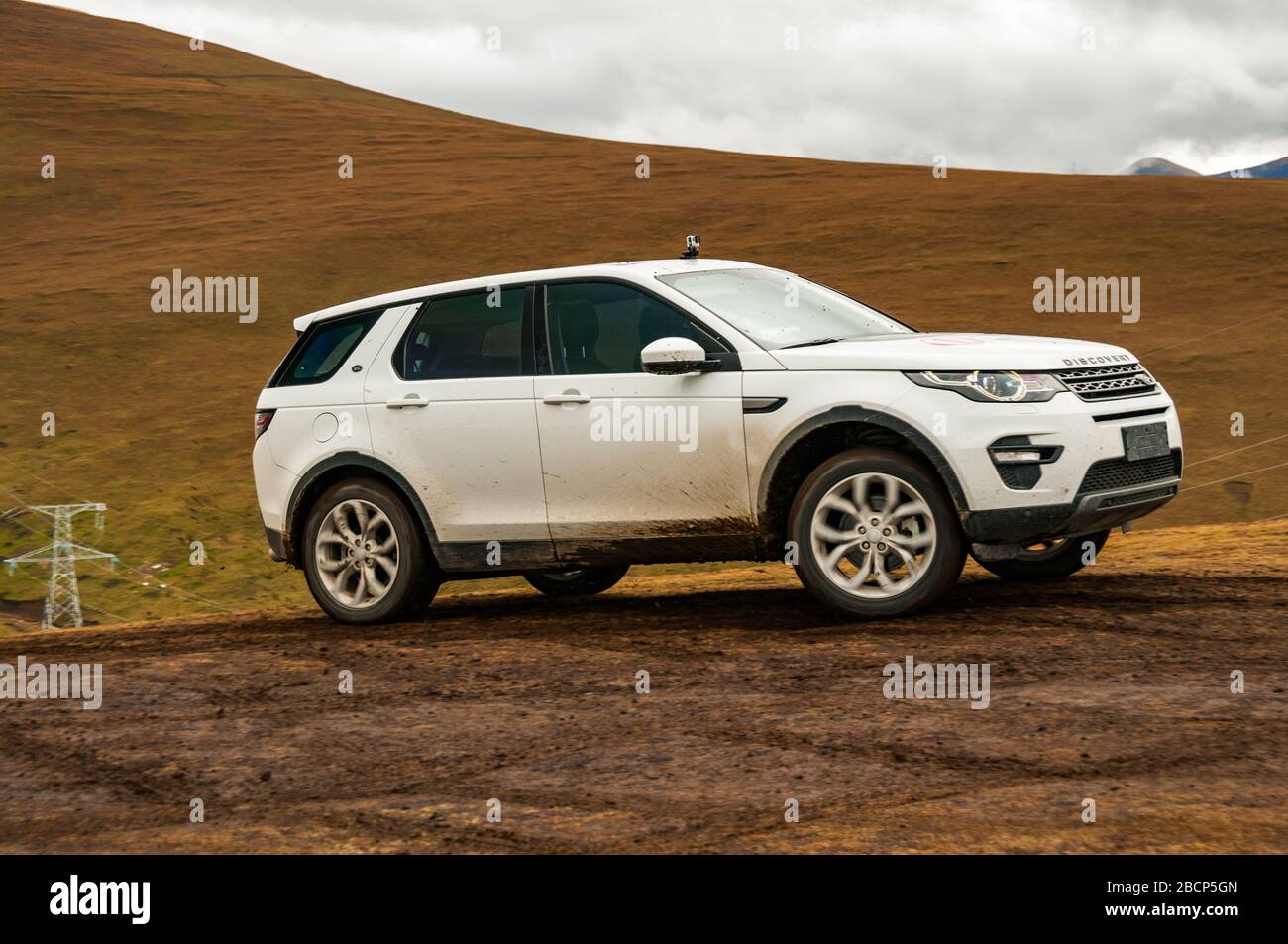 Land Rover Discovery Sport being driven off road on a mountain in ...