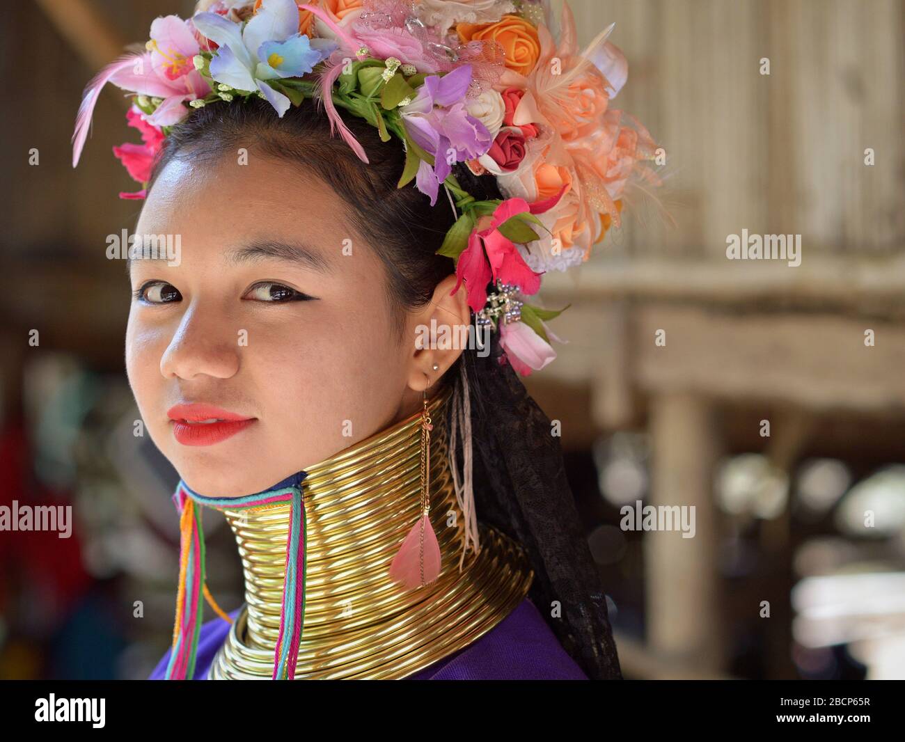 Pretty Thai/Burmese long-neck Kayan teen girl (“giraffe woman”) with ...