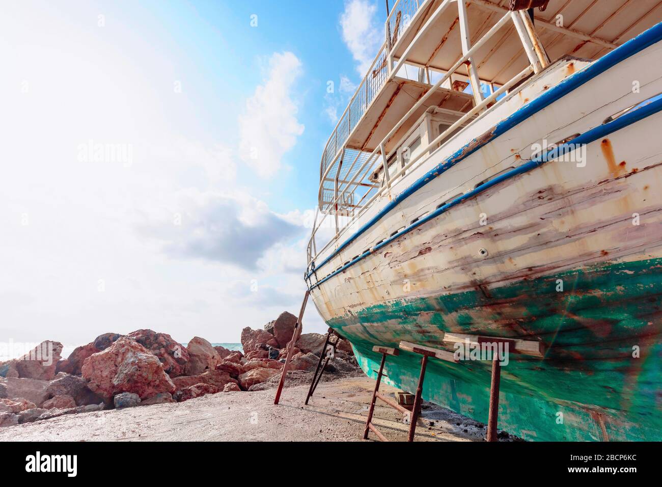 Old broken wooden ship on the seashore of Mediterranean sea Stock Photo ...