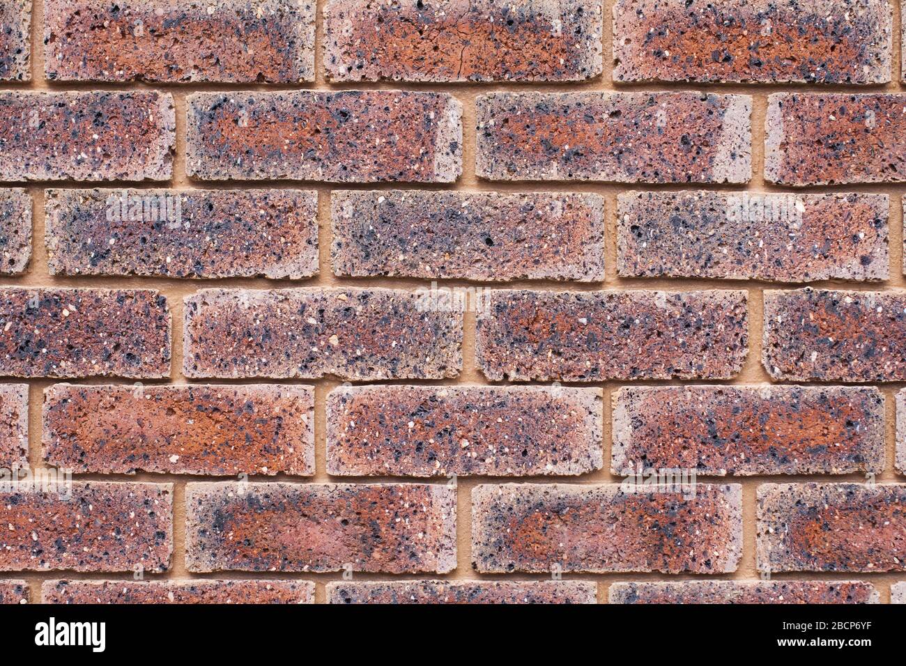 Rustic brick wall in close Stock Photo - Alamy