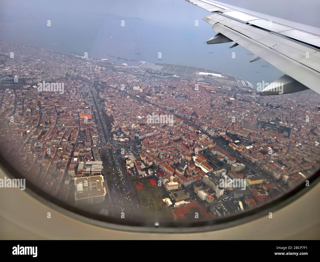 View from the plane window with a wing Stock Photo - Alamy